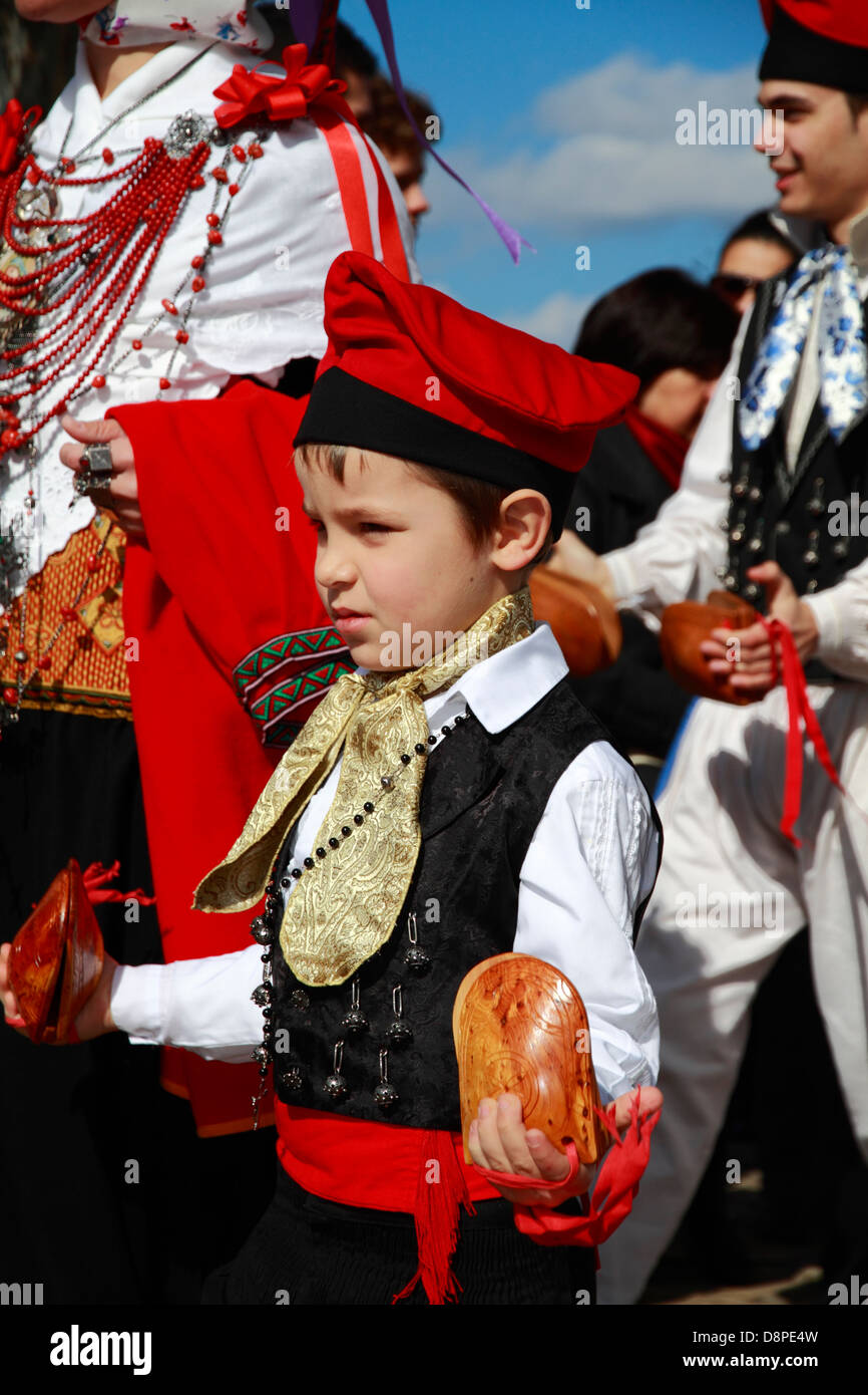 detail view of a young boy in traditional costume at a folklore dance ...