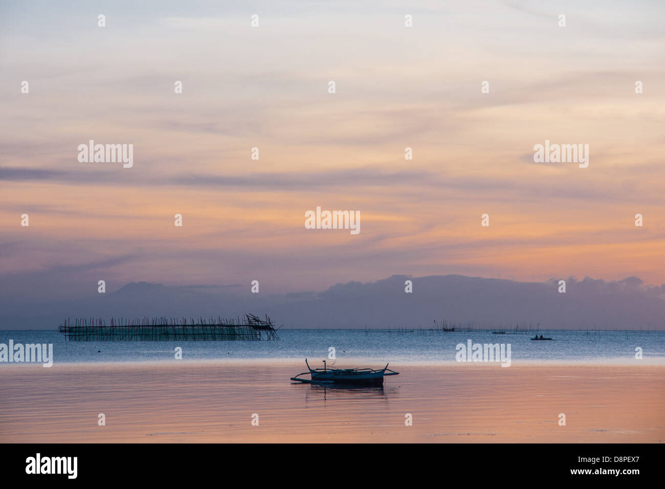 Outrigger bangka - a traditional Filipino fishing boat - moored in ...
