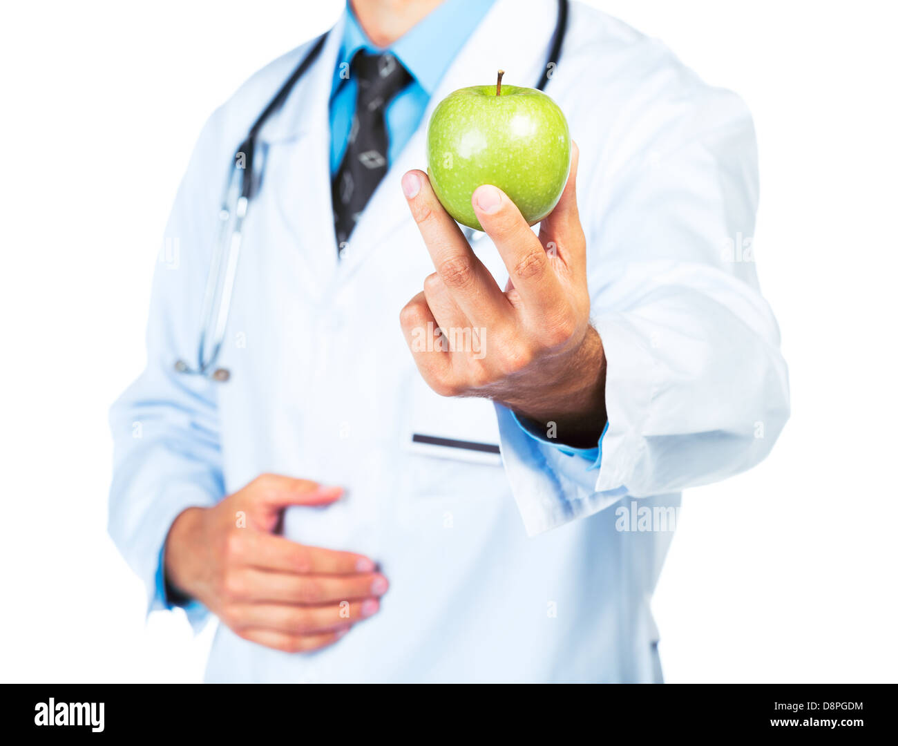 Doctor's hand holding a fresh green apple close-up on white background ...