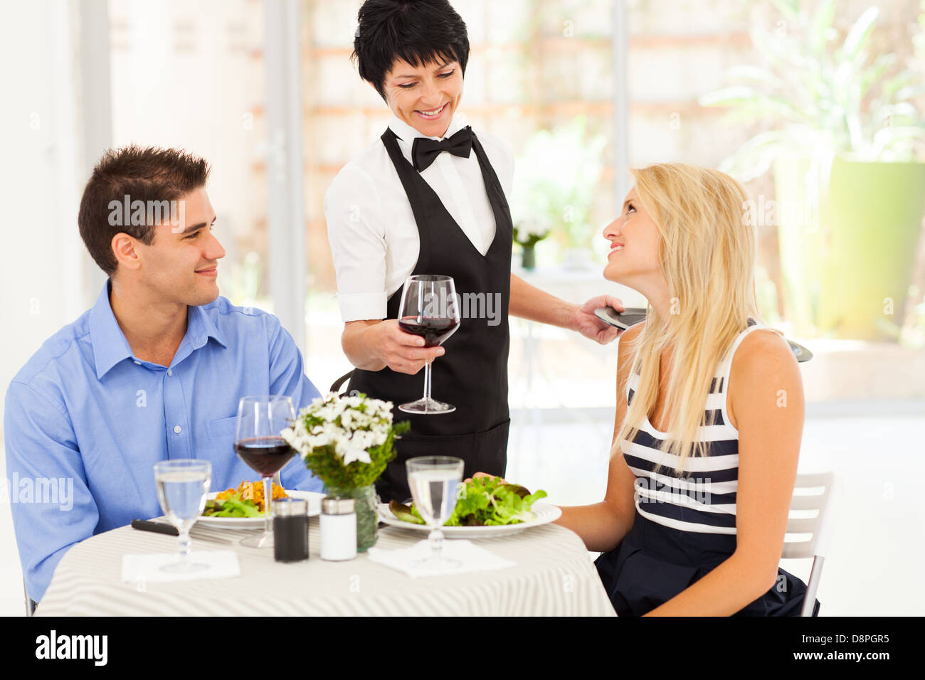 Waitress Serving Wine