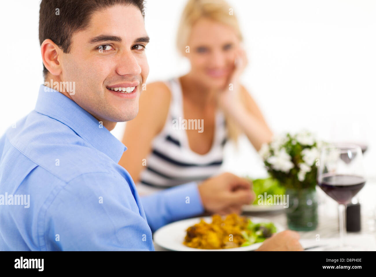 happy young couple dining out in restaurant Stock Photo - Alamy