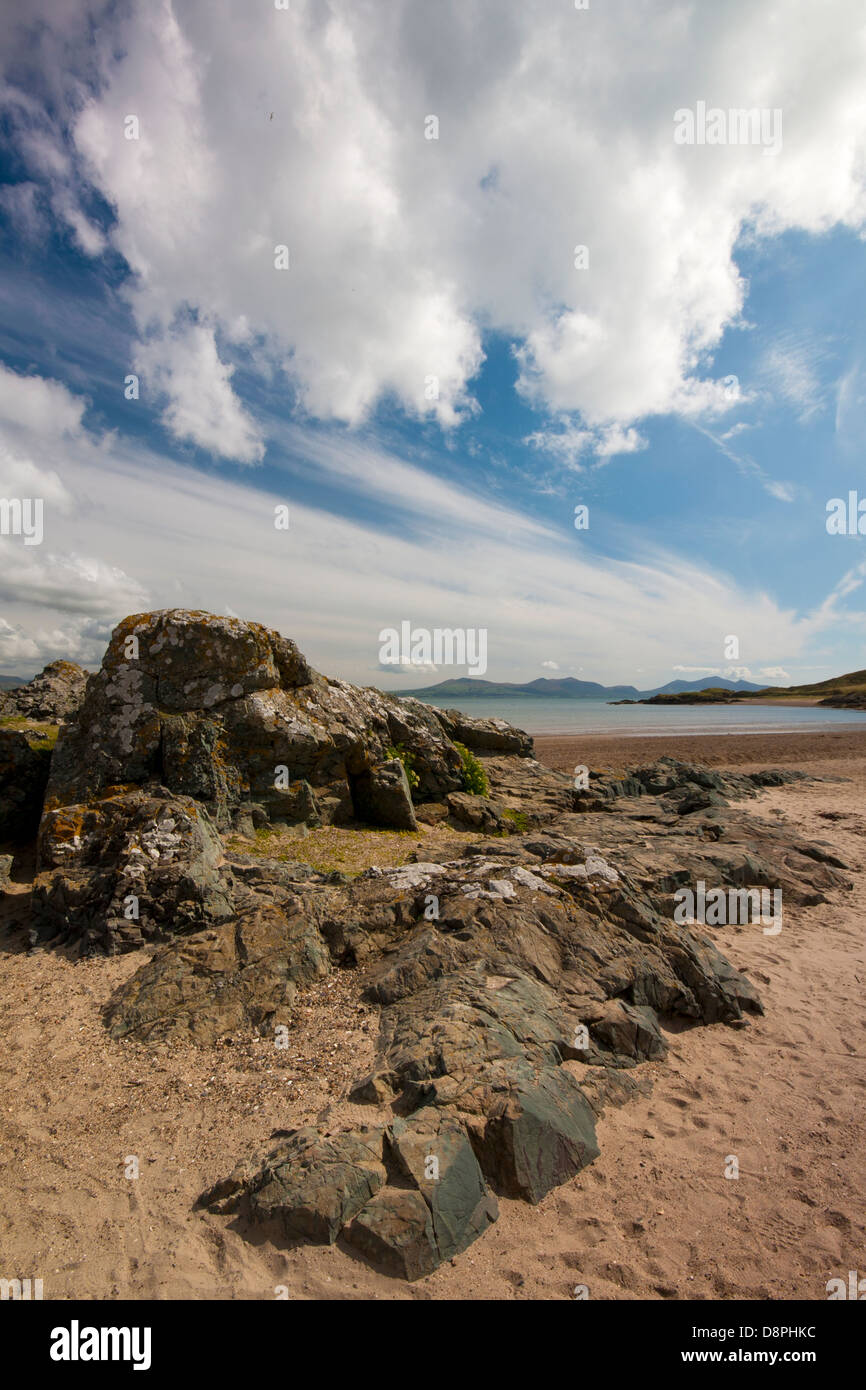 Rocks and clouds, Newborough Beach, Anglesey Stock Photo - Alamy