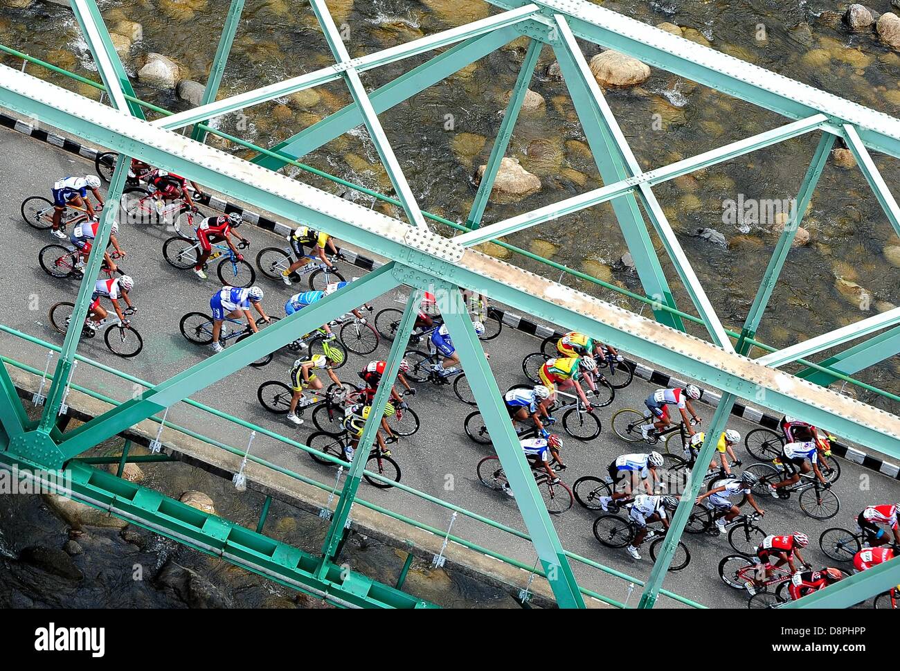 Sumatra, Indonesia. 2nd June 2013. Riders speeding their bike pass ...