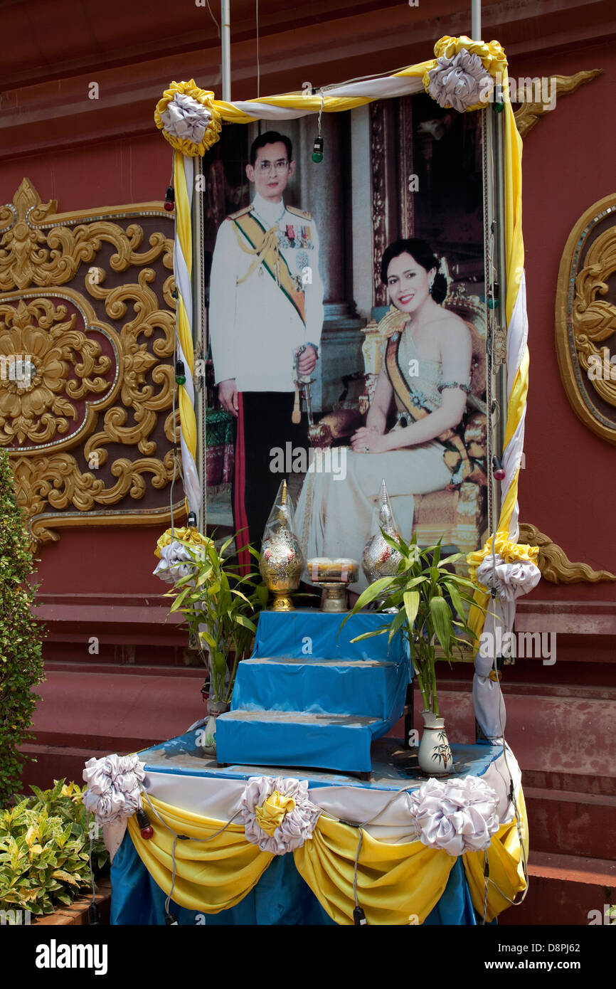 An old photo of Thailand's King and Queen on display in the Mekong ...