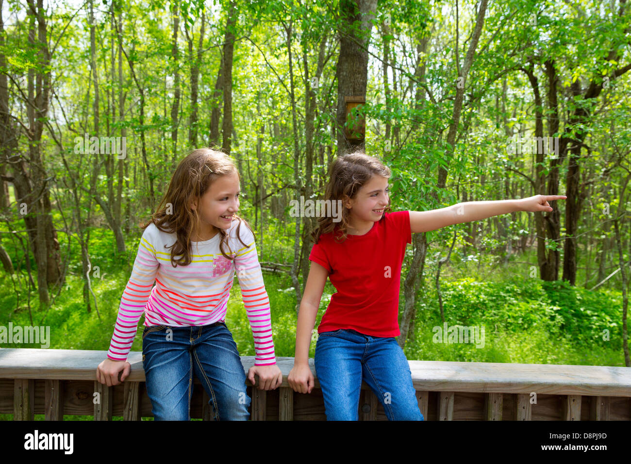 Children playing park fence hi-res stock photography and images - Alamy