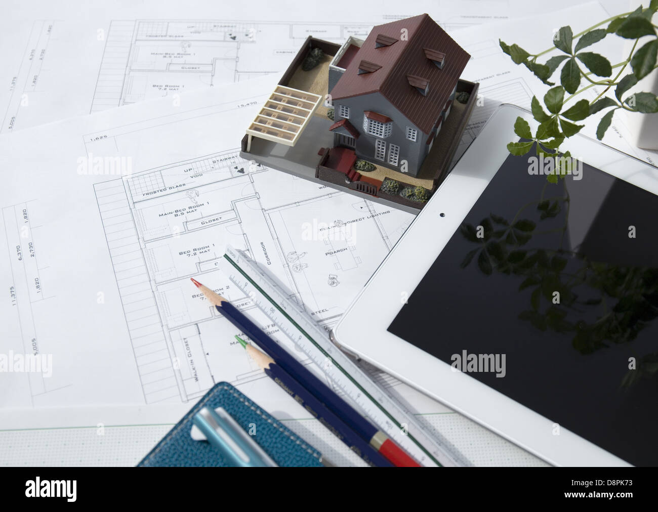 Architectural drawing, an architectural model and a tablet PC Stock ...