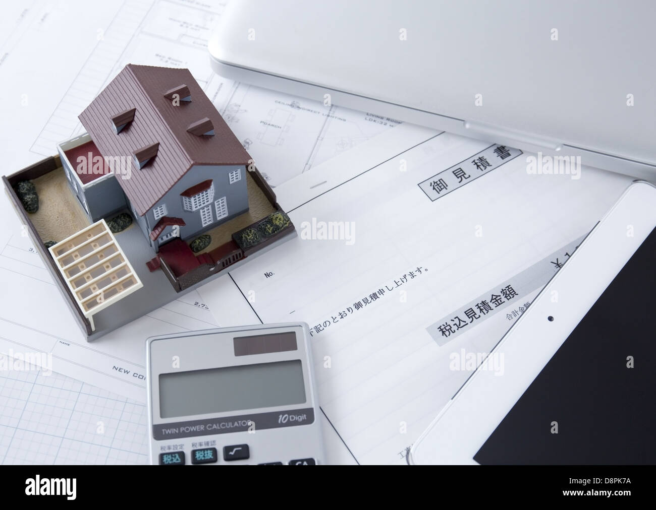 Estimate and an architectural model Stock Photo - Alamy