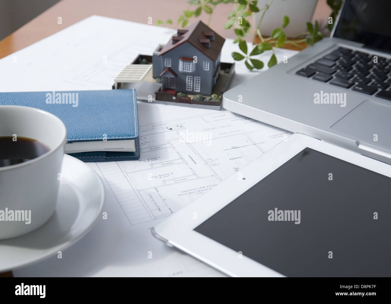 Architectural drawing, an architectural model and a tablet PC Stock ...