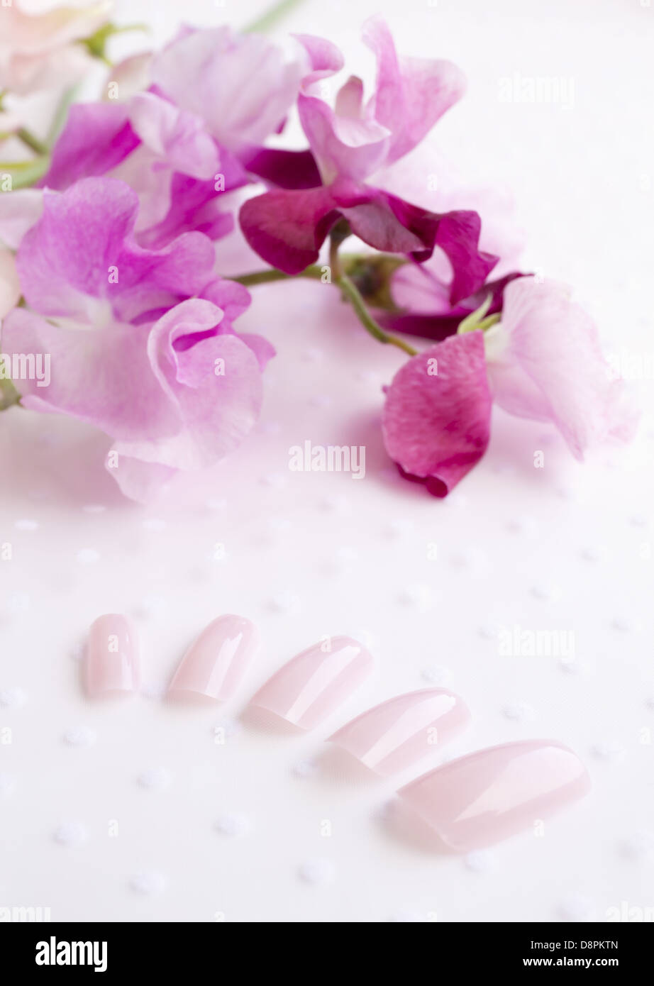 Nail chips and sweet pea Stock Photo - Alamy