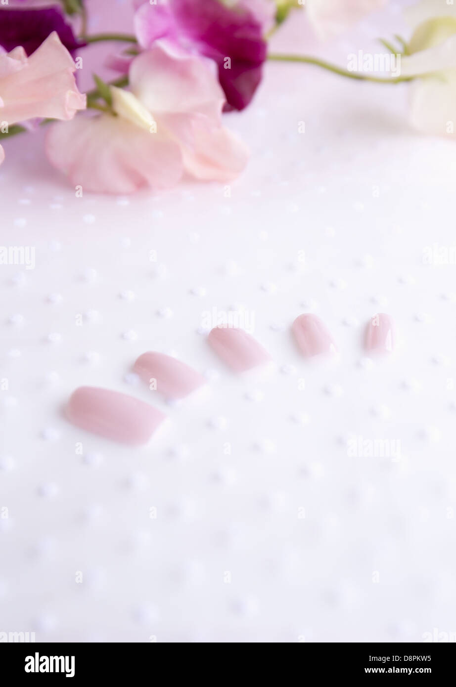 Nail chips and sweet pea Stock Photo - Alamy