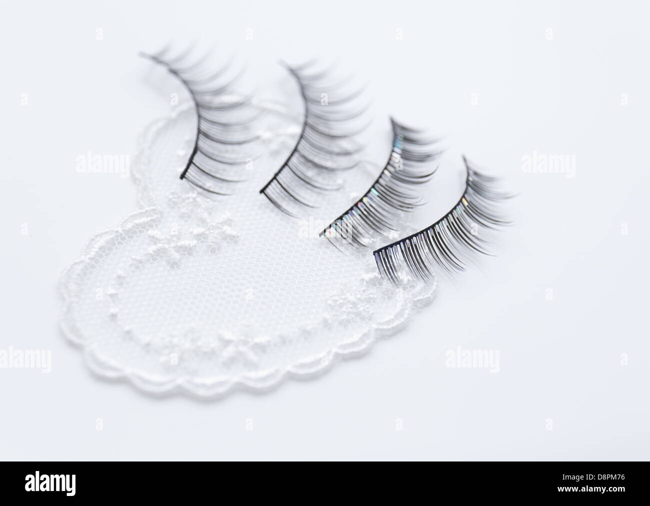 Eyelashes and heart shaped lace Stock Photo - Alamy
