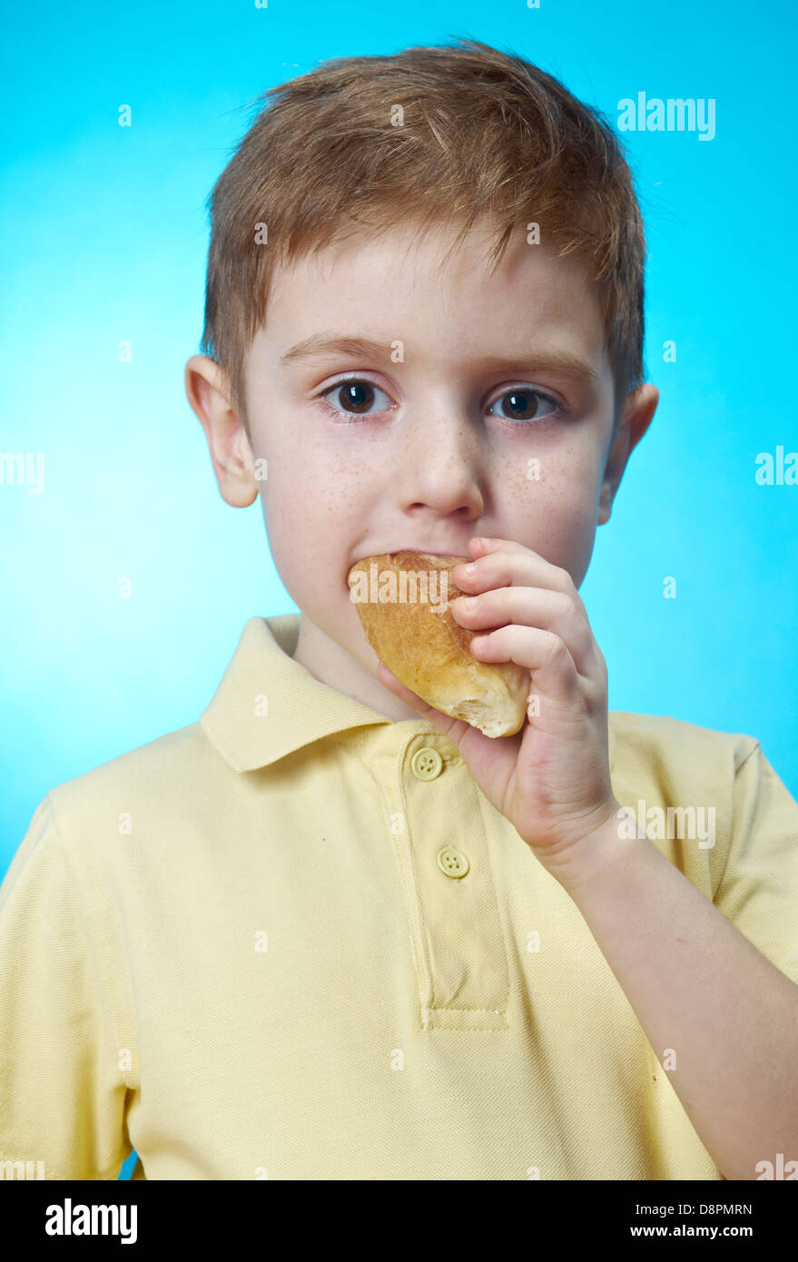 little boy eats homemade pie Stock Photo - Alamy