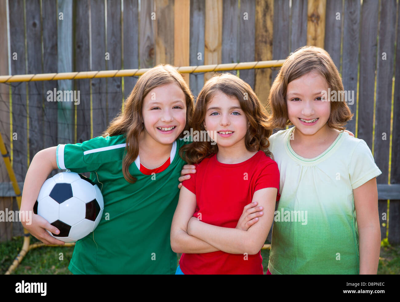 School girls playing football hi-res stock photography and images - Alamy