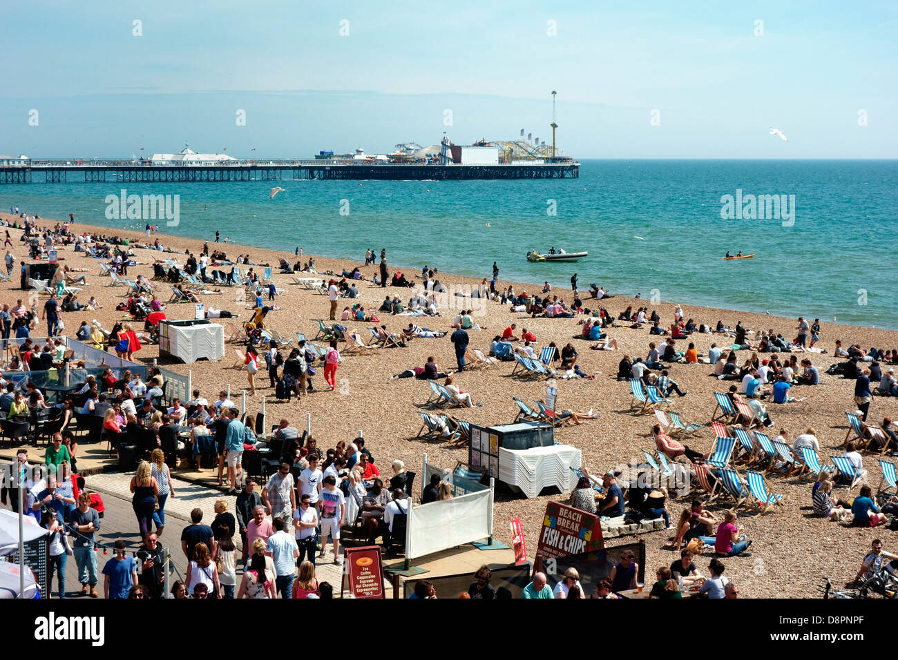 Crowded Brighton beach on a sunny day Stock Photo - Alamy