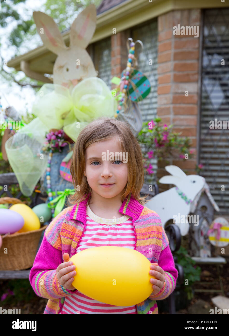 Easter bunny holding egg in hi-res stock photography and images - Alamy