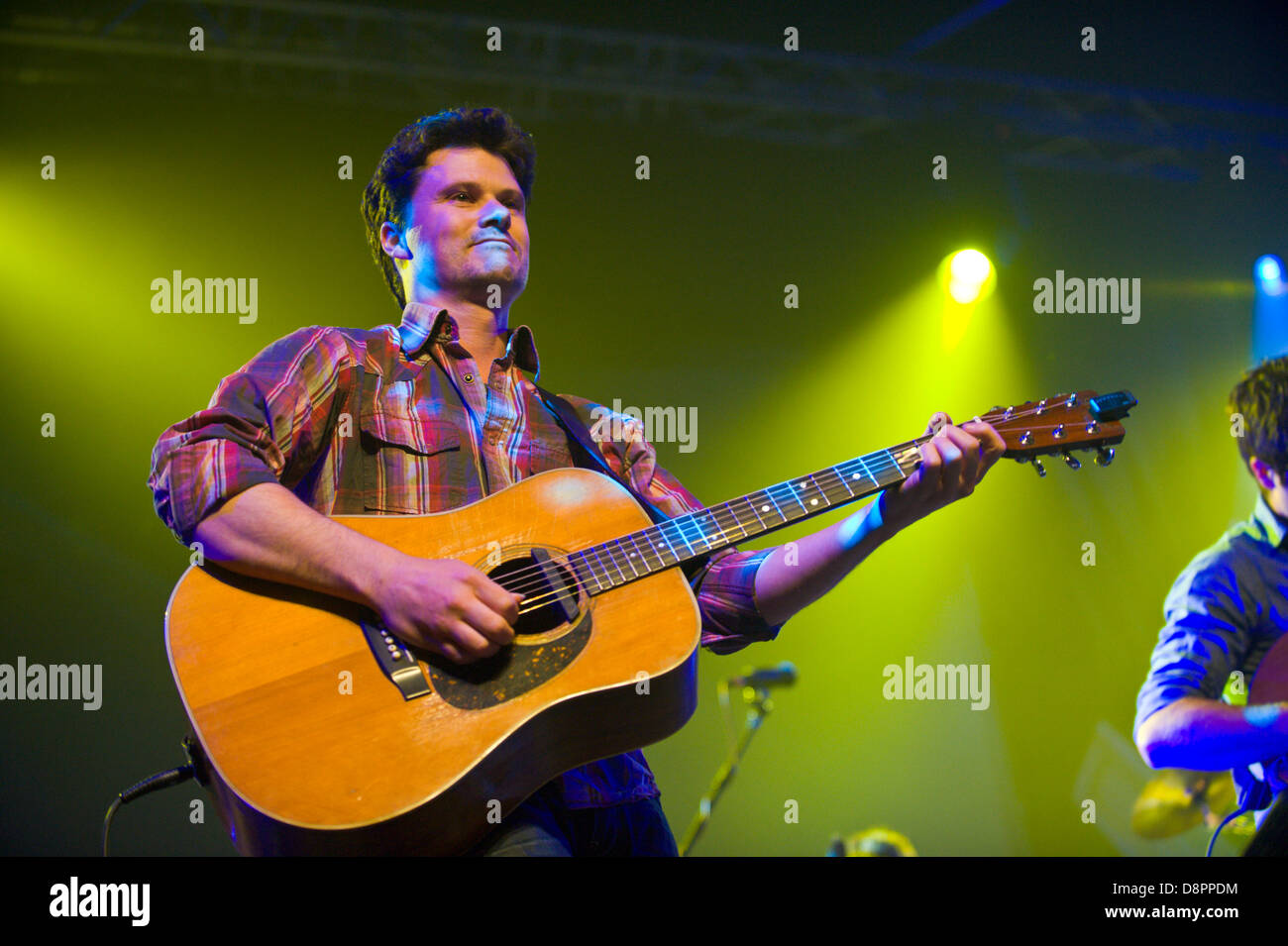 Sean Lakeman playing with Seth Lakeman band on stage at Hay Festival ...