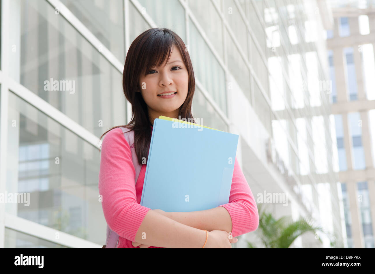 A portrait of an Asian college student on campus Stock Photo - Alamy