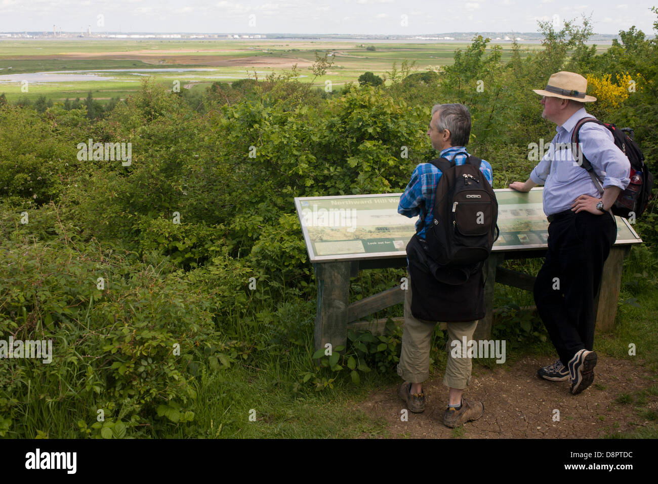 Two country ramblers look across Northwood Hill's landscape below, an ...