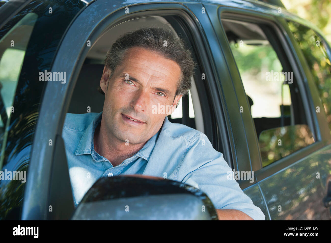 Man in car, portrait Stock Photo - Alamy