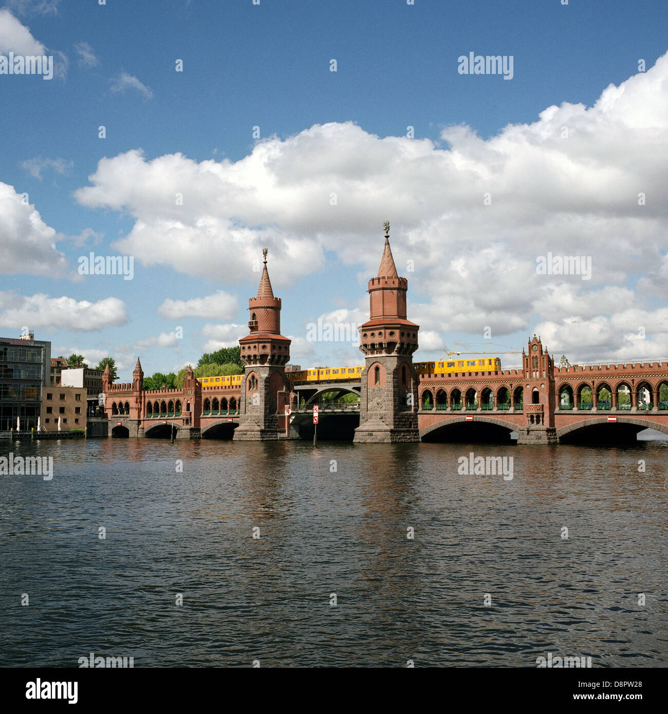 Berlin. Germany. The Oberbaumbrücke (Oberbaum bridge) spans the River ...