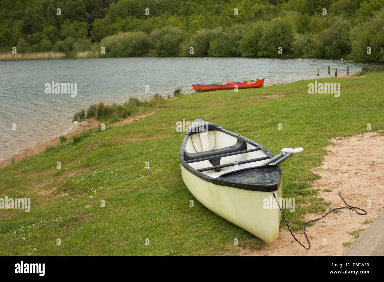 Canoe's at Astbury Lake, English holiday Stock Photo - Alamy