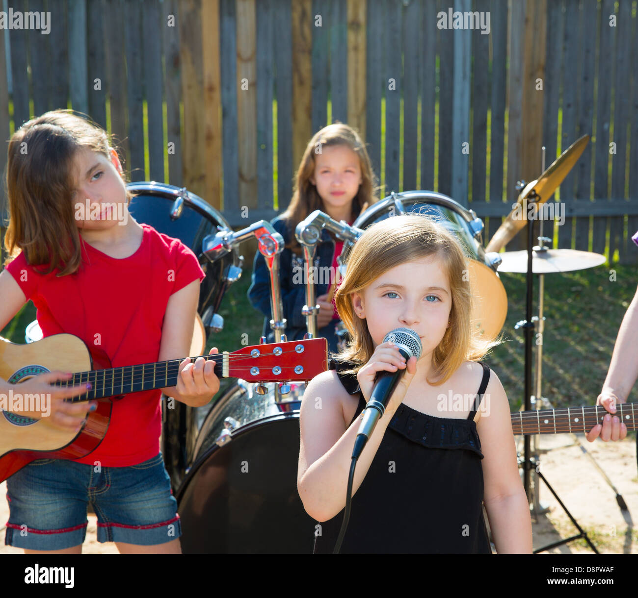 Young music player band friends hi-res stock photography and images - Alamy