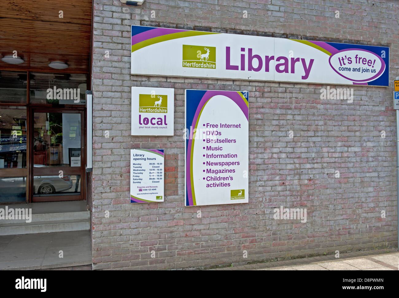Library sign in small British town Stock Photo - Alamy
