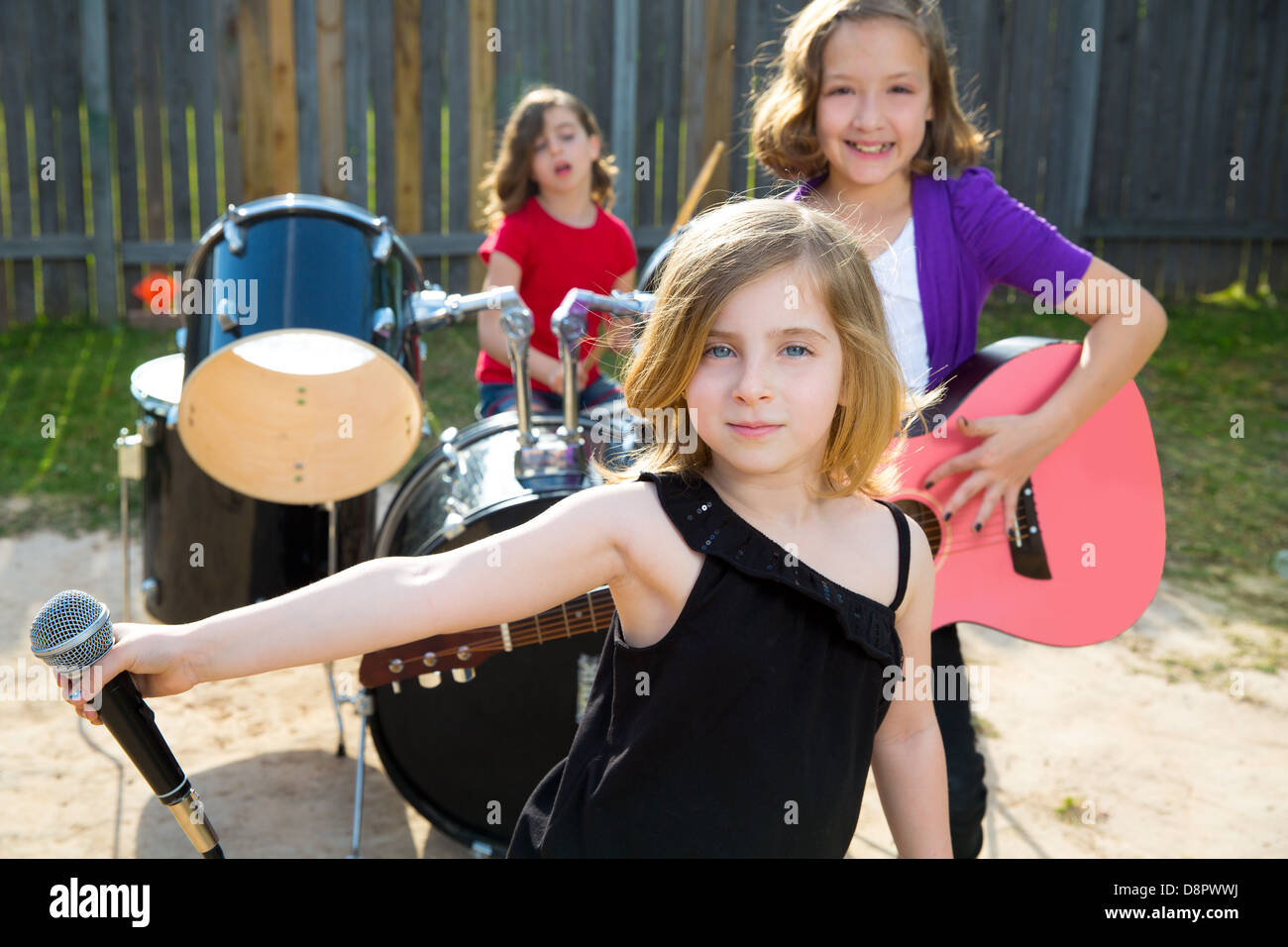 Children playing musical instruments hi-res stock photography and ...