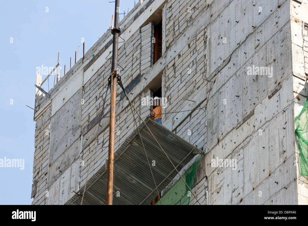 Worker on a Construction Site in Manila, Philippines Stock Photo - Alamy