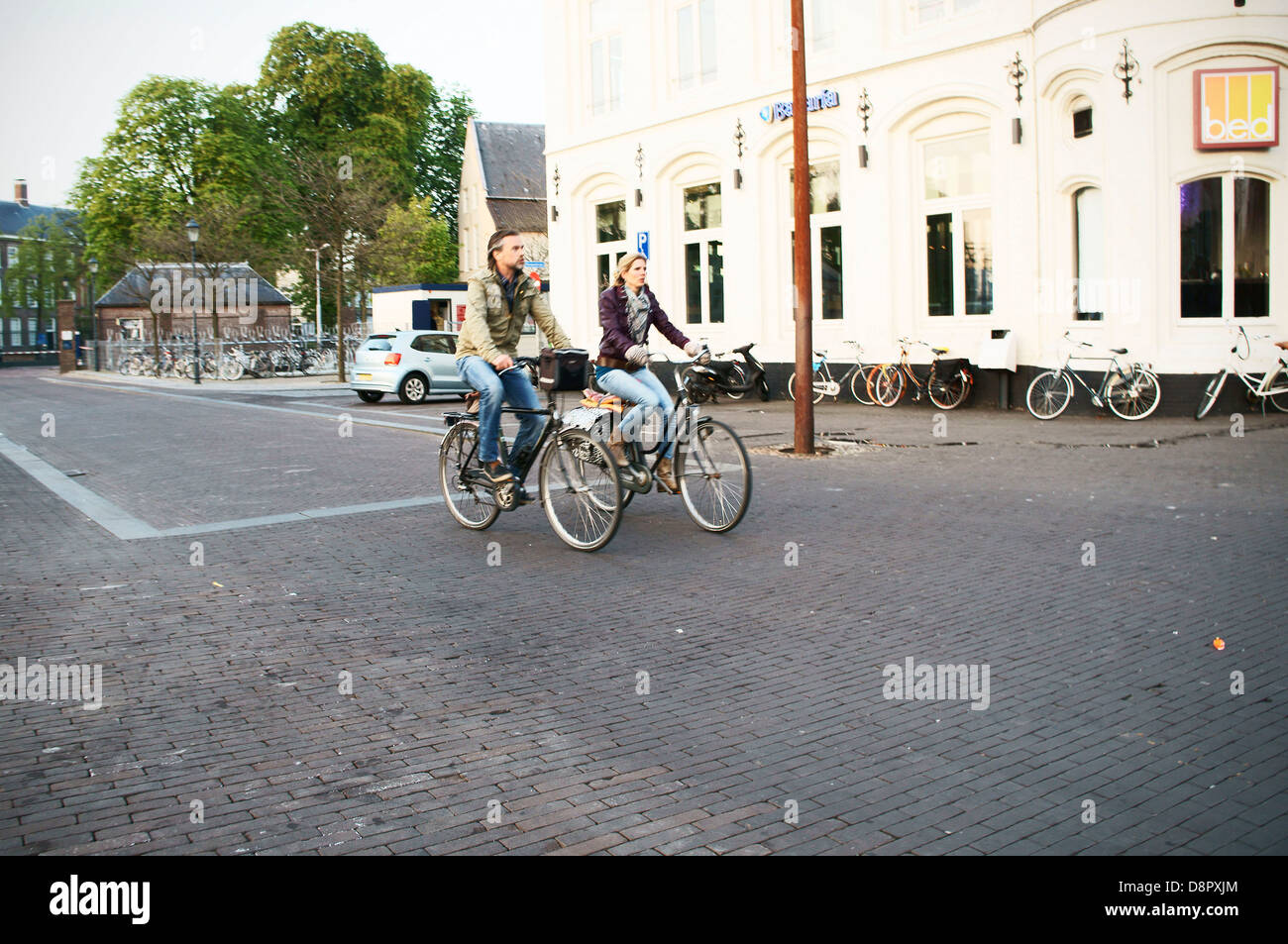 cycling, road, cobblestone pavement, man, woman, Breda, Netherlands on ...