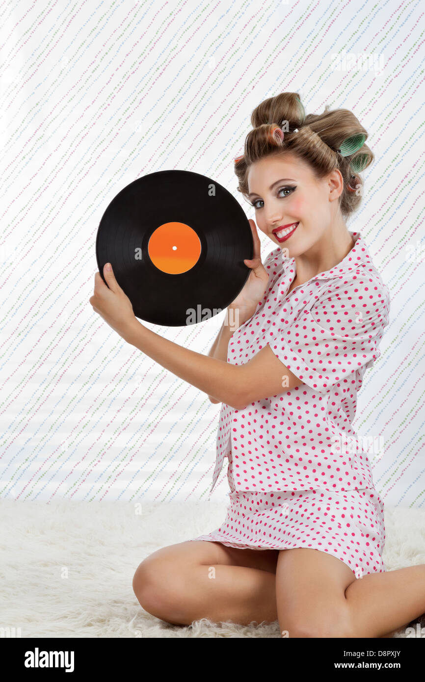 Beautiful Woman Holding Vinyl Record Stock Photo - Alamy
