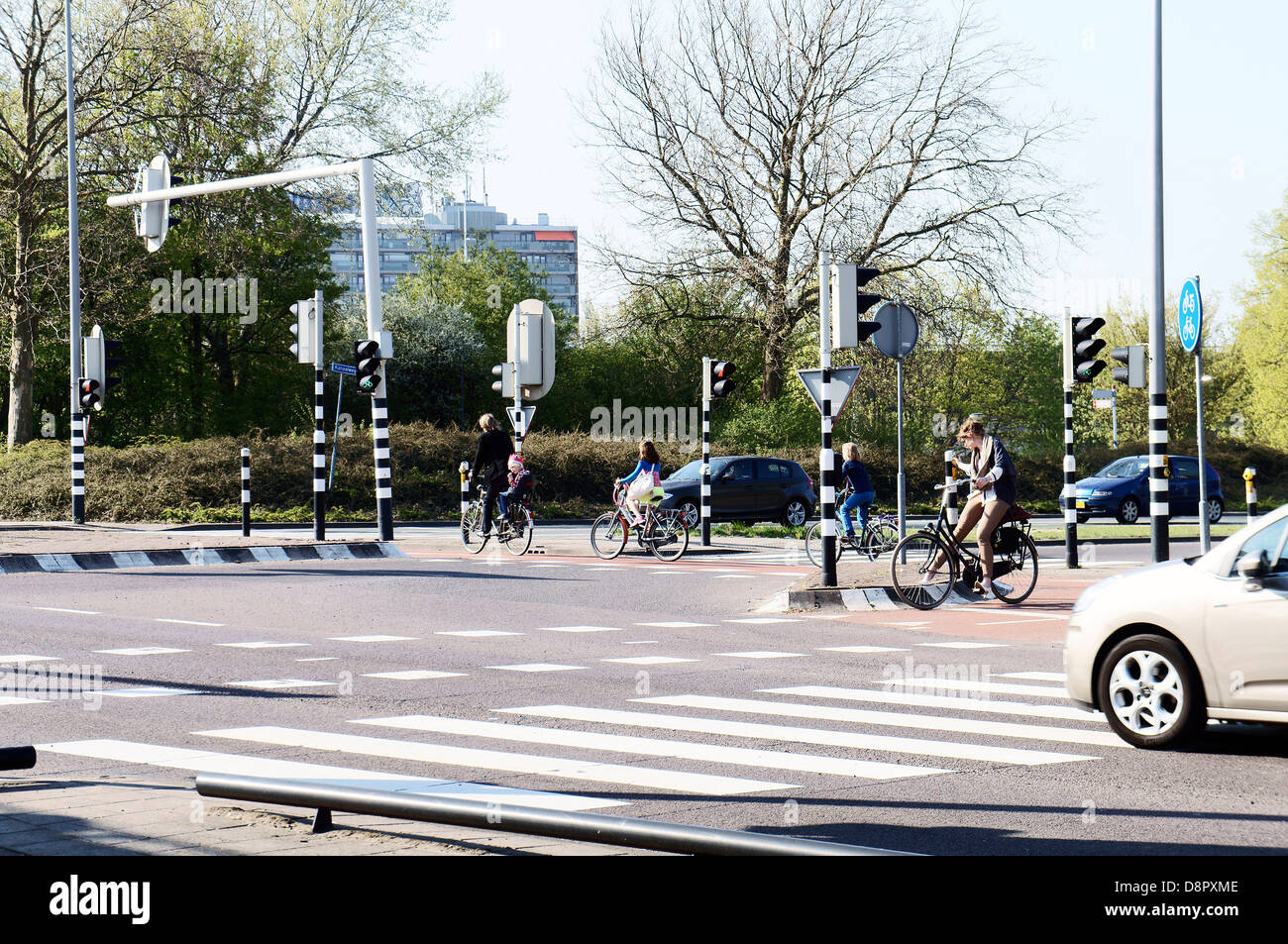 cycling path road pedestrian crossing light cross-roads woman children ...