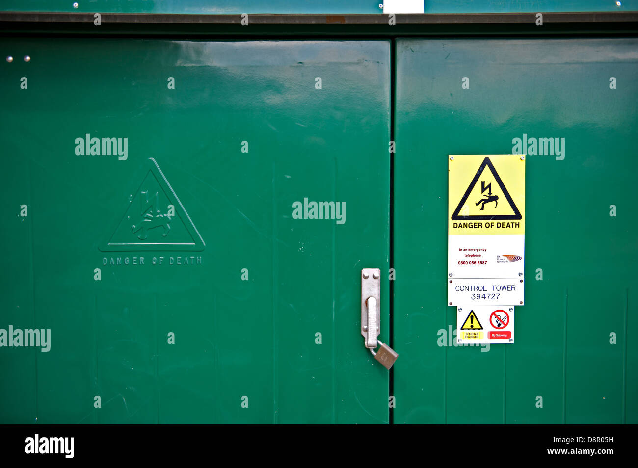 Electrical cabinet with warning signs Stock Photo - Alamy