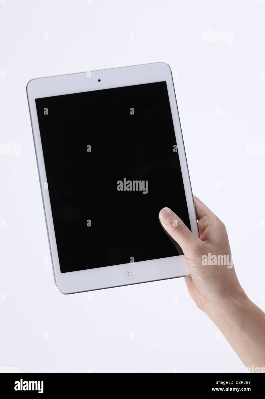 Hand holding a tablet hi-res stock photography and images - Alamy