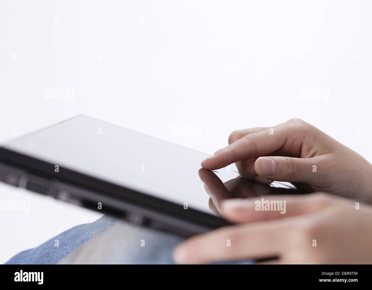 Hands using a tablet PC Stock Photo - Alamy