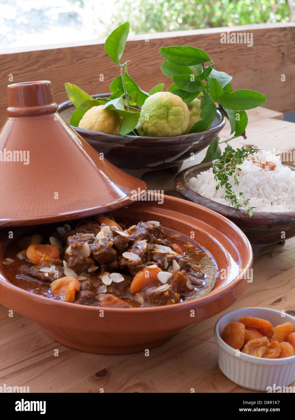 Traditional Moroccan stew of carrots and beef with side dishes of white ...