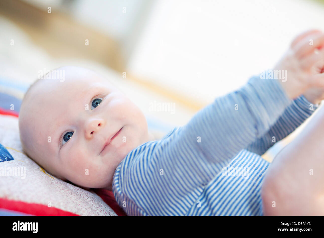 baby boy lying on back Stock Photo - Alamy