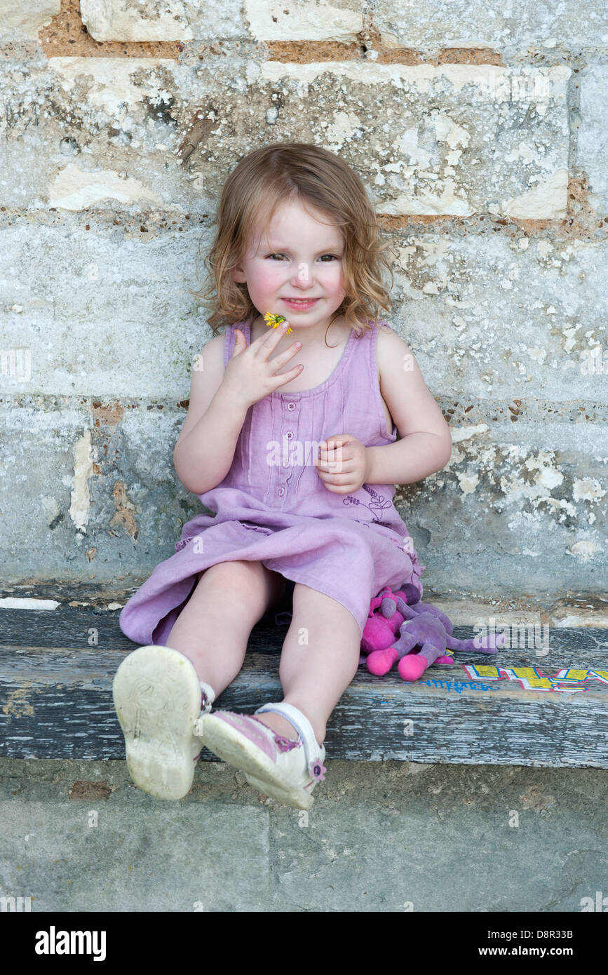 Kids sitting on curb on hi-res stock photography and images - Alamy