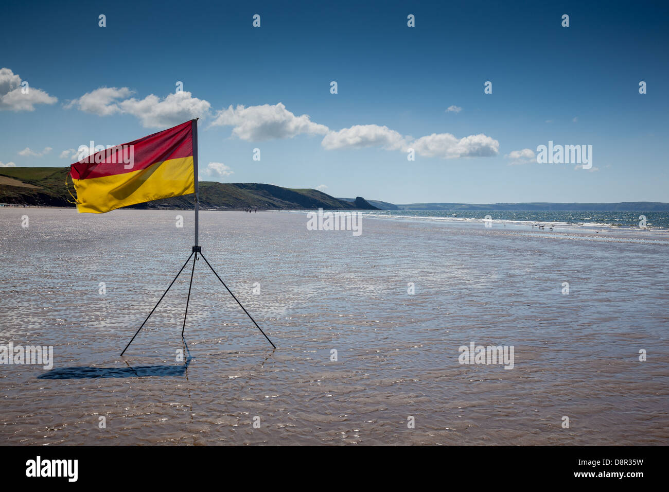 Lifeguard flag on Newgale beach, Pembrokeshire, Wales Stock Photo - Alamy