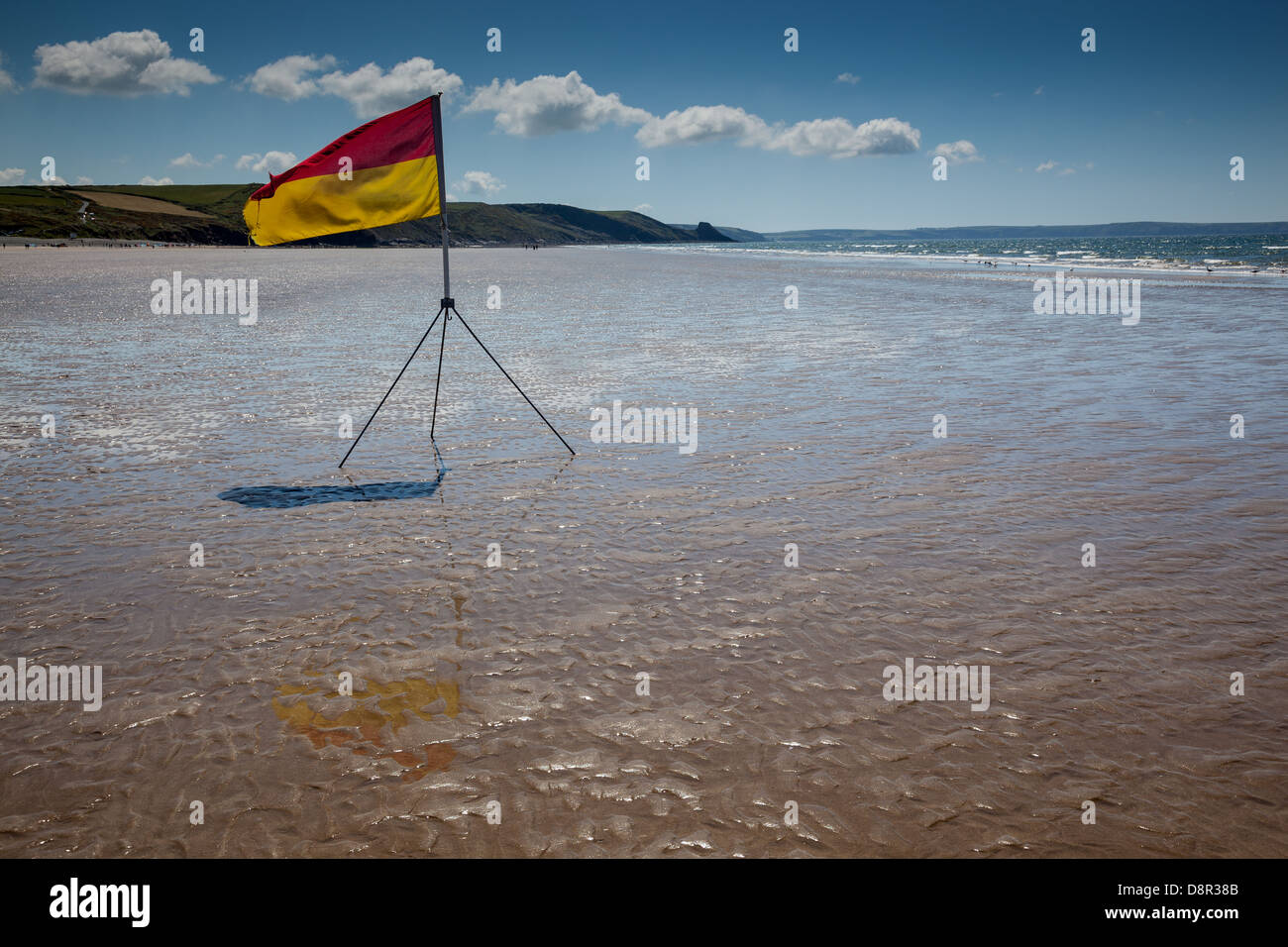 Lifeguard with beach flag hi-res stock photography and images - Alamy