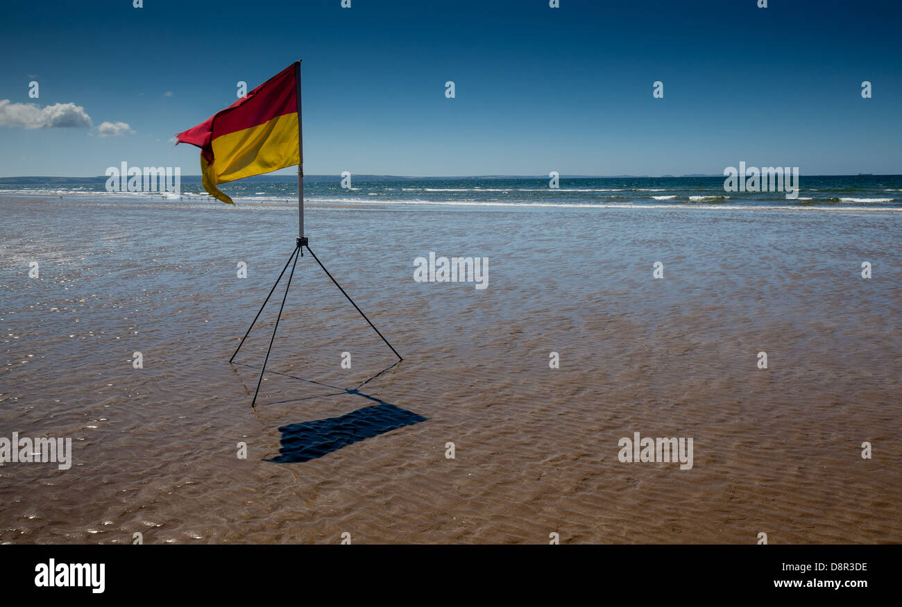 Lifeguard flag on Newgale beach, Pembrokeshire, Wales Stock Photo - Alamy