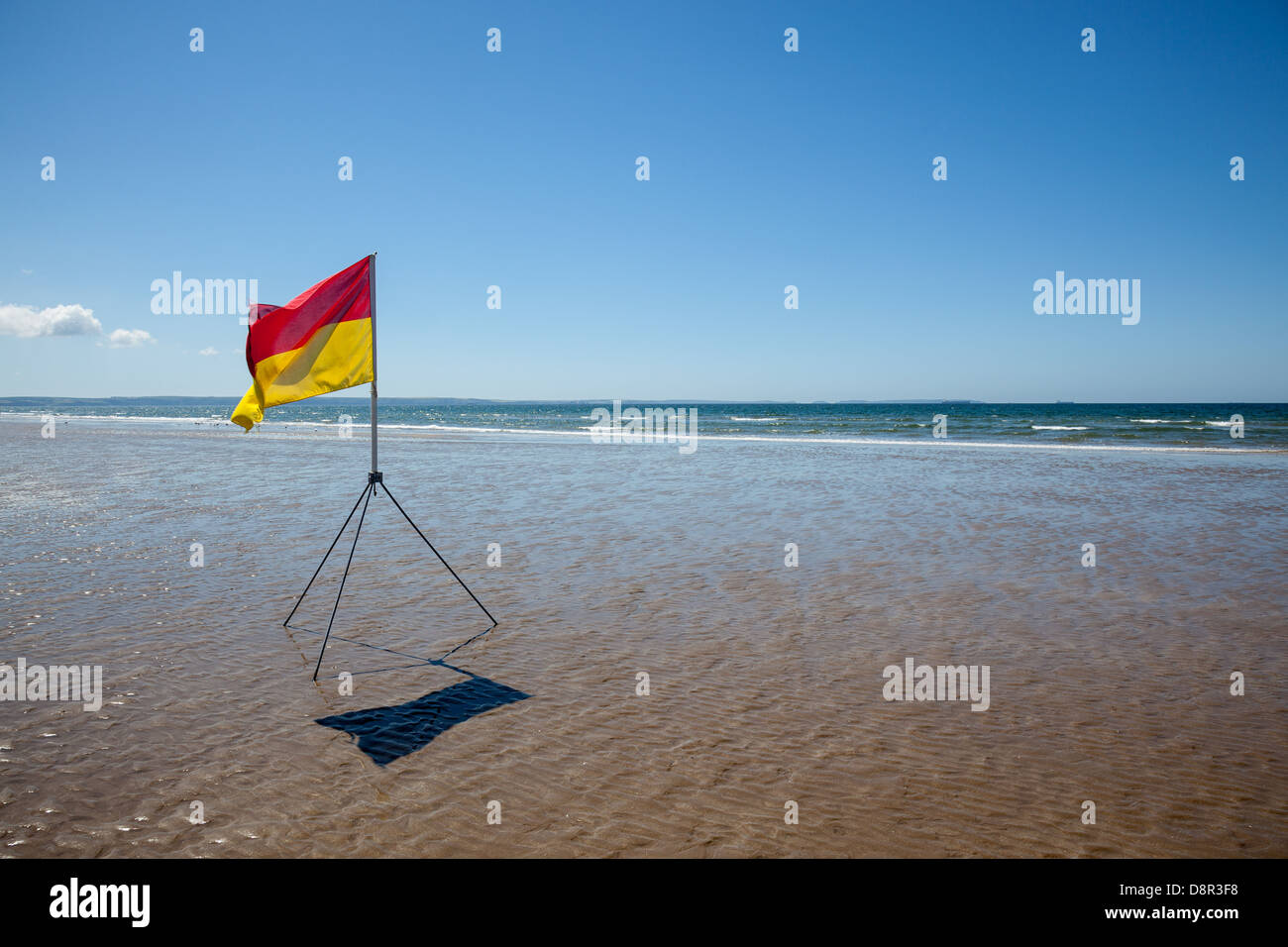 Lifeguard flag on Newgale beach, Pembrokeshire, Wales Stock Photo - Alamy