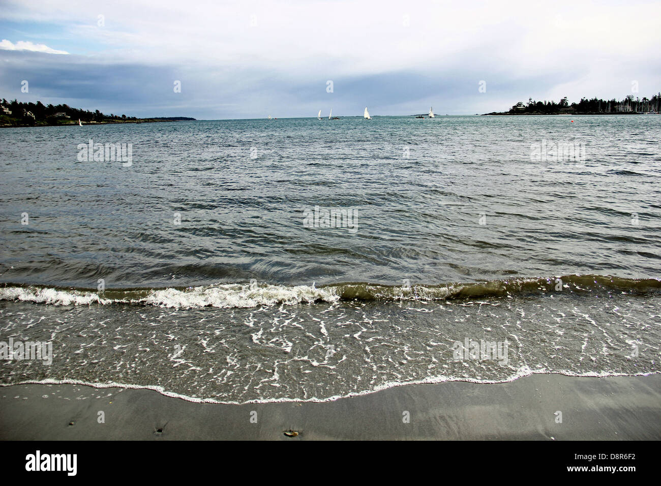 The ocean rolling on the beach hi-res stock photography and images - Alamy