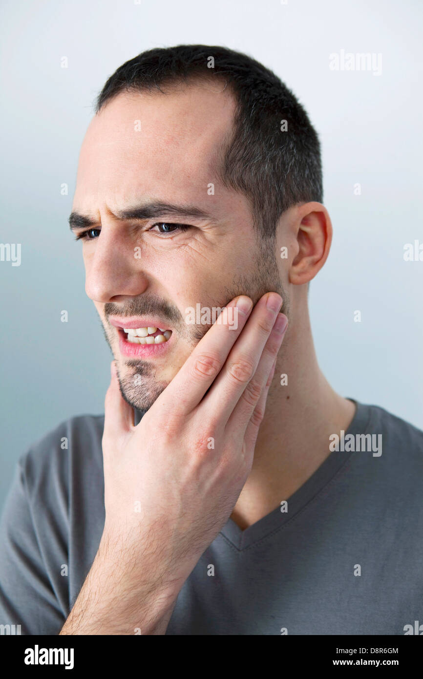 MAN WITH TOOTHACHE Stock Photo - Alamy