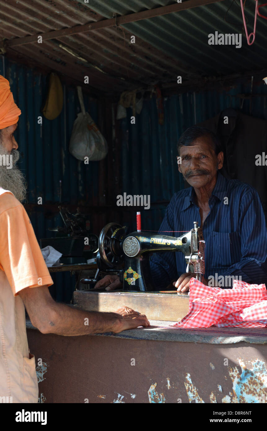 Indian tailor traditional sewing machine hi-res stock photography and ...