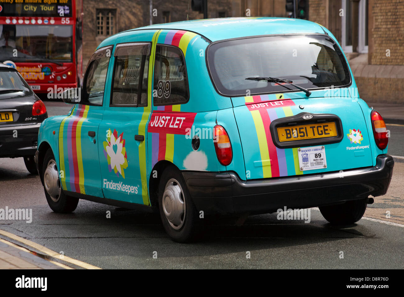Colourful taxi at Oxford, Oxfordshire UK in May Stock Photo - Alamy