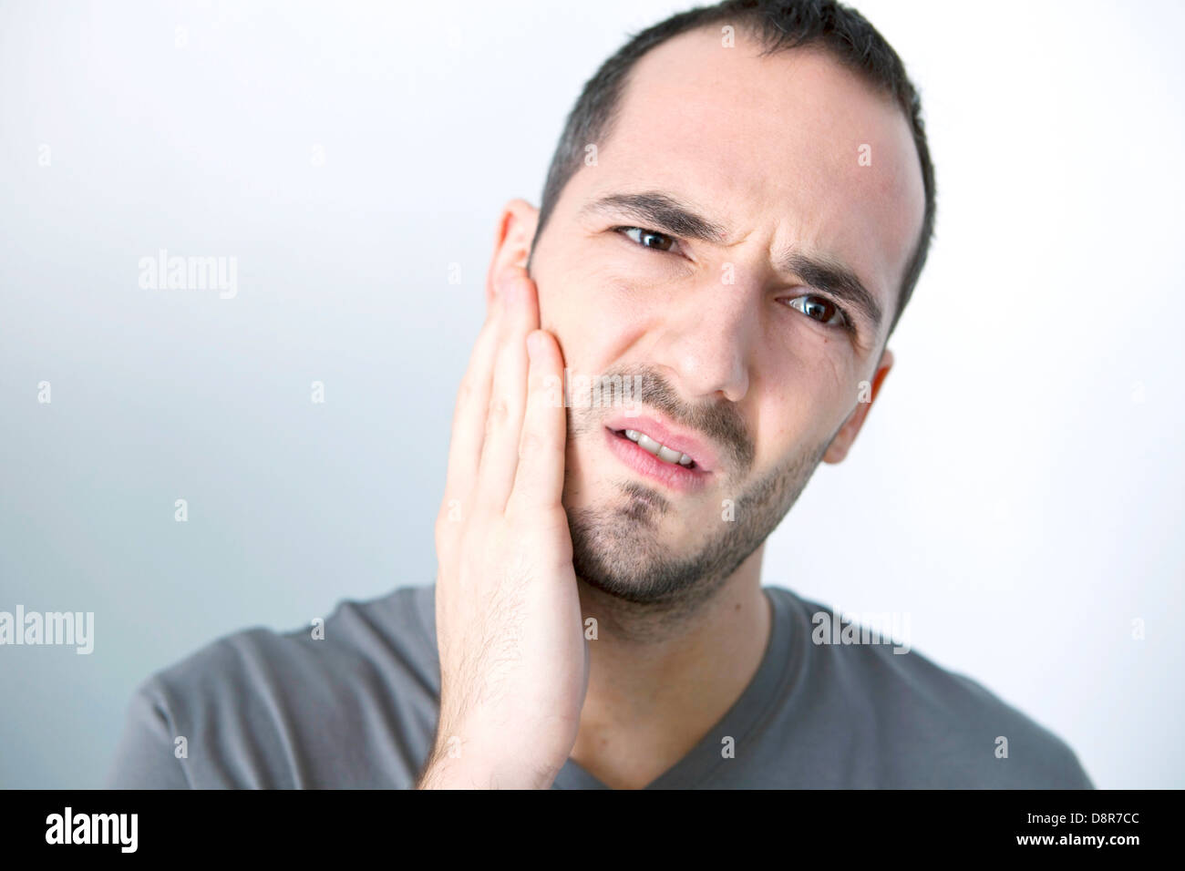 MAN WITH TOOTHACHE Stock Photo - Alamy