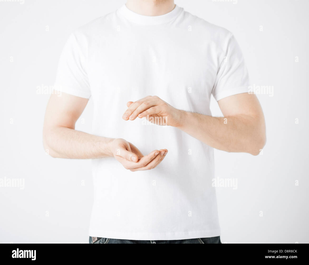 mans hands showing something Stock Photo - Alamy