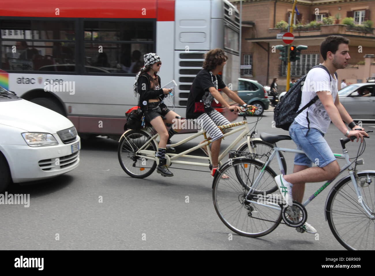 Tandem bike lots of people hi-res stock photography and images - Alamy