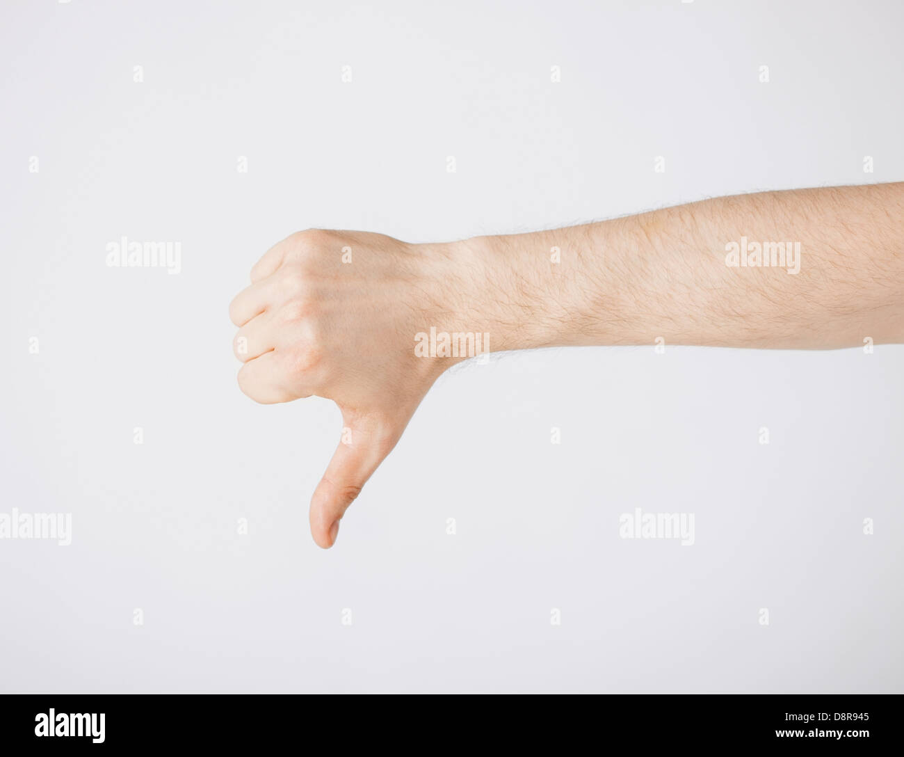 man showing thumbs down Stock Photo - Alamy